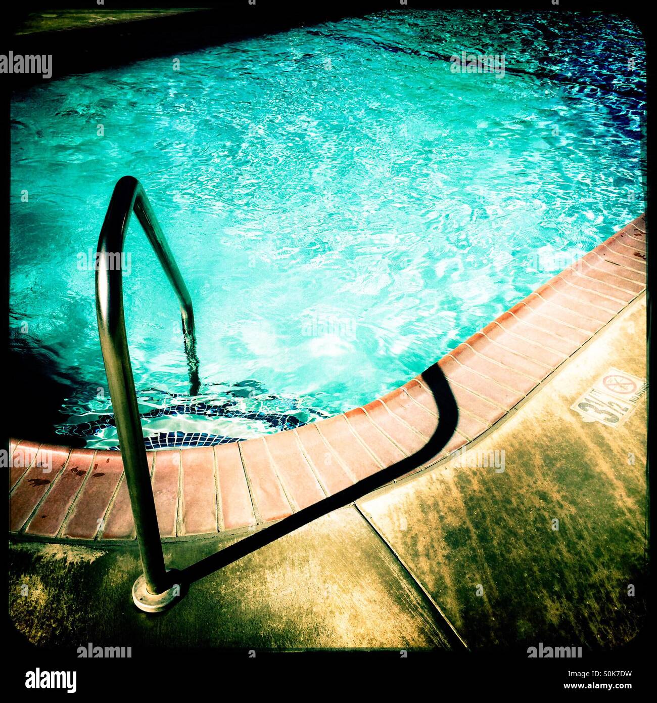 A ladder and steps at an empty swimming pool Stock Photo - Alamy