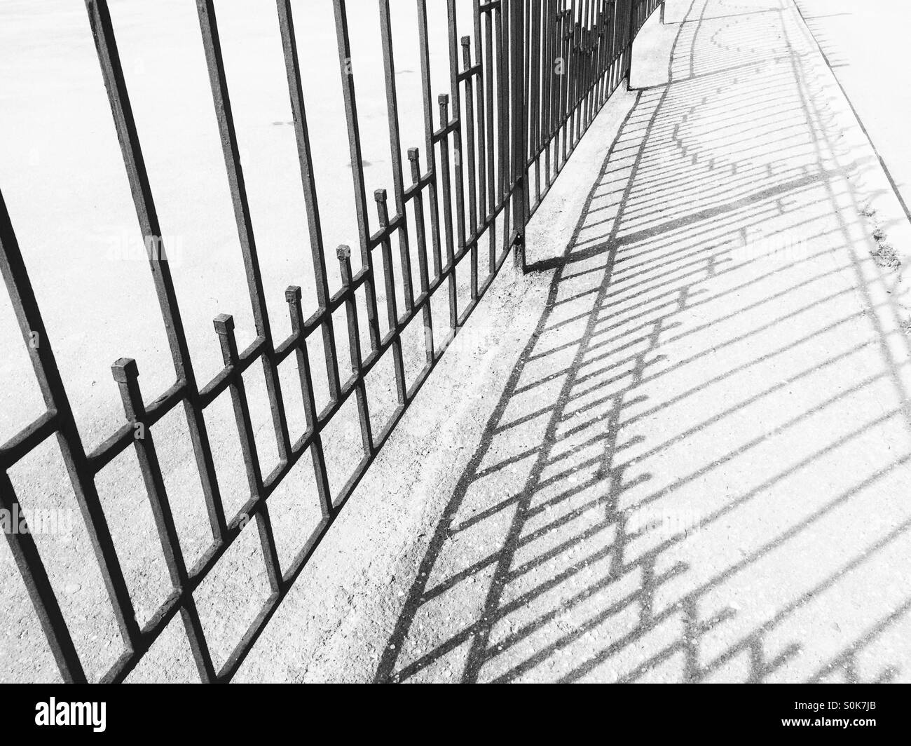 Metal fence shadow in hi-res stock photography and images - Alamy