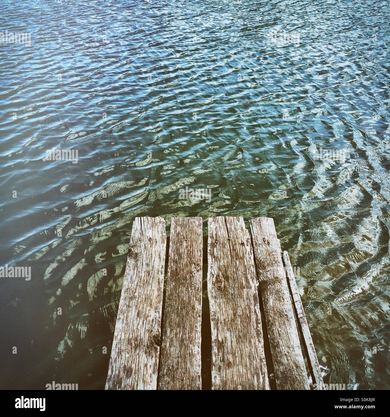 Jetty over river Stock Photo - Alamy