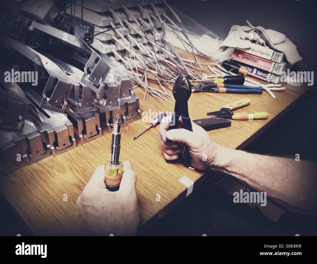 Ready to work... Electrician with tools at the table Stock Photo - Alamy