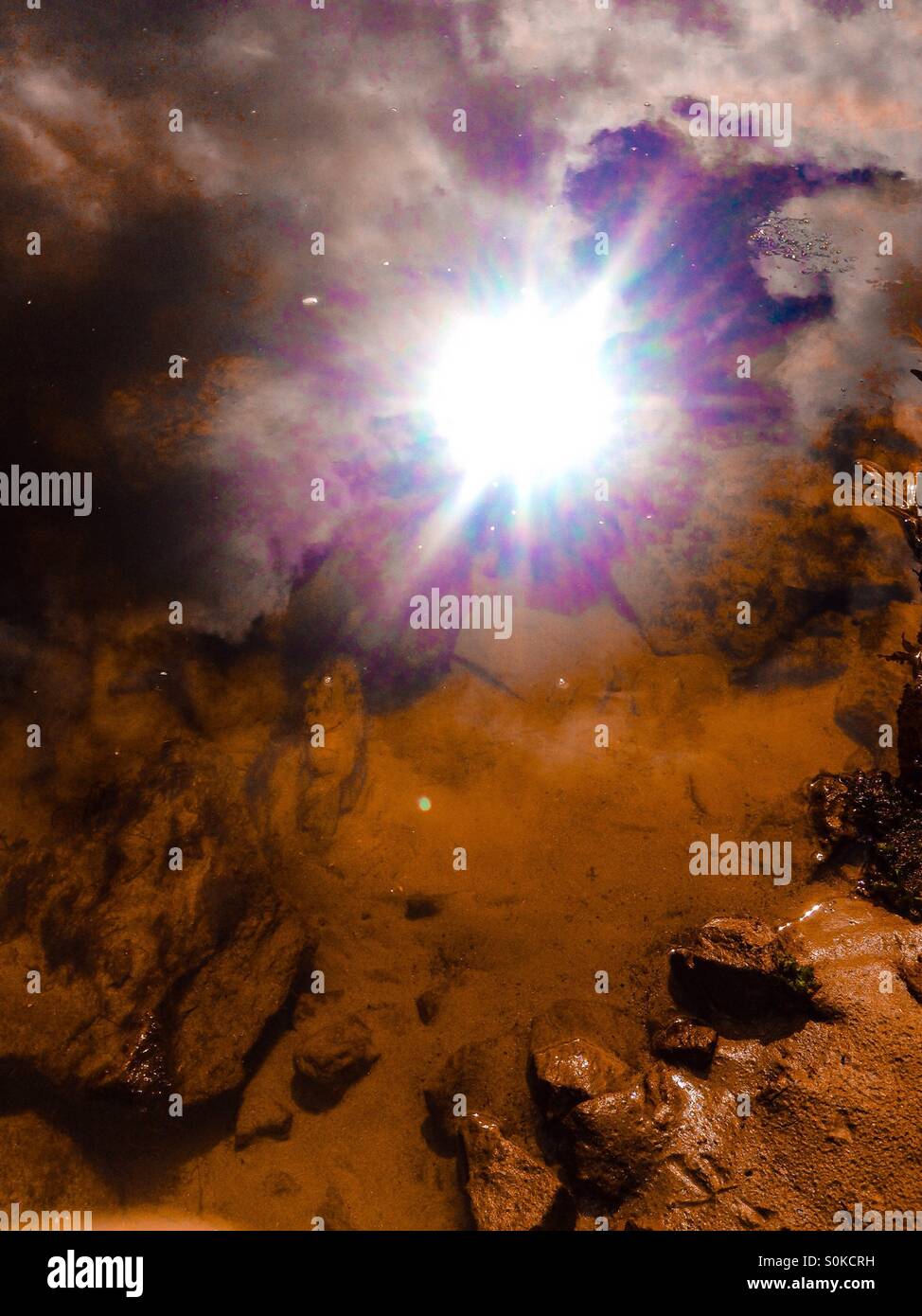 Sun in the sea Stock Photo - Alamy