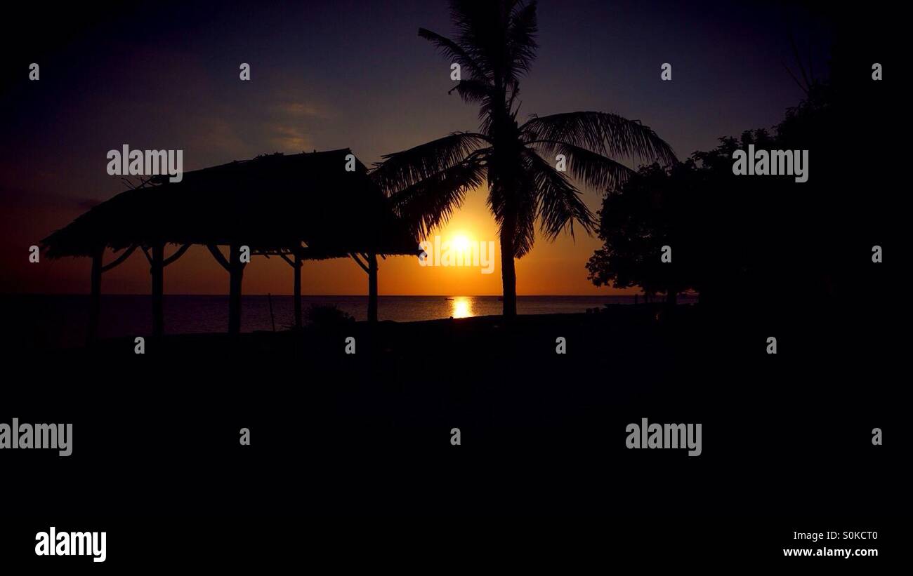 Sunset at moyo island Stock Photo - Alamy