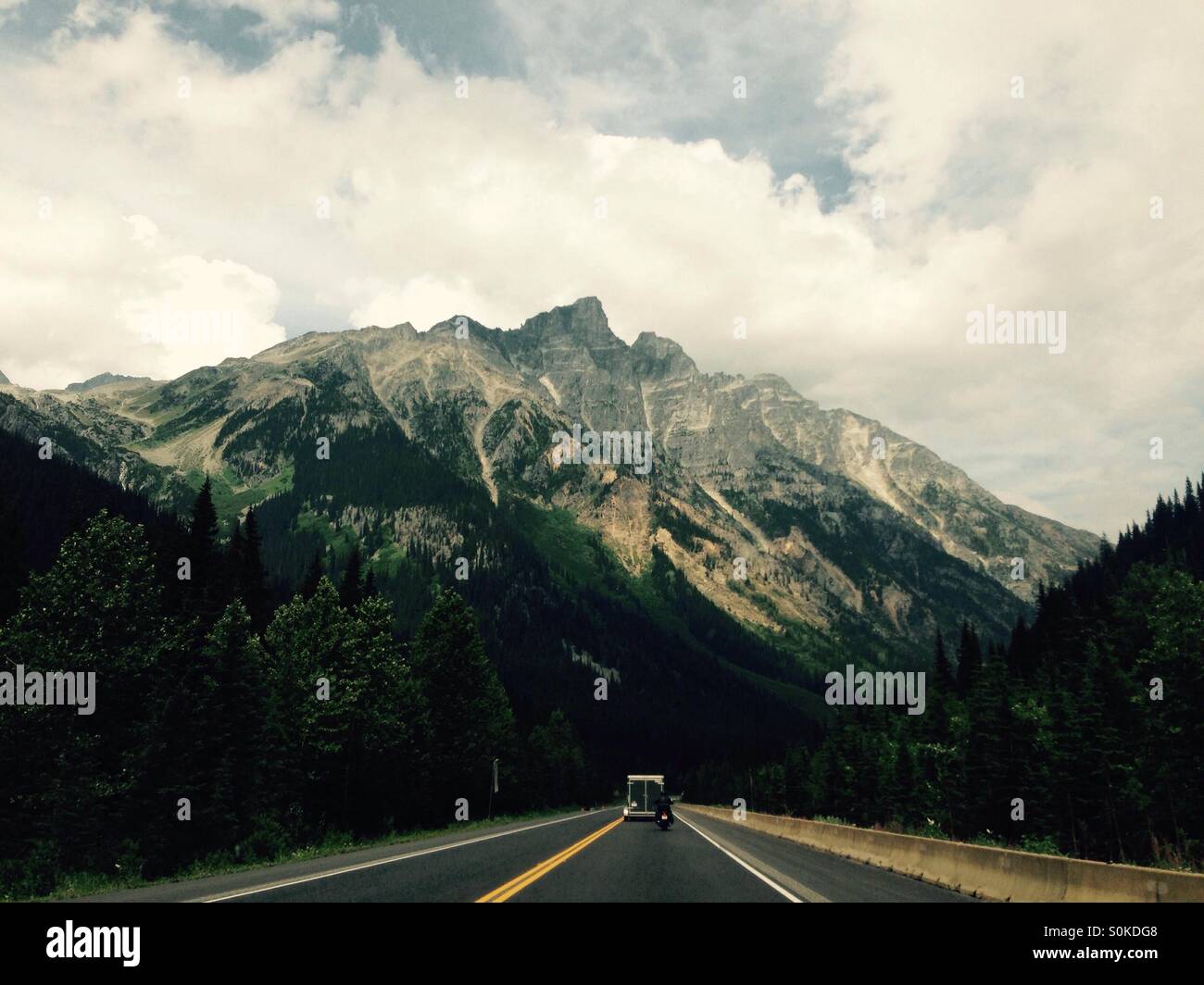 Driving along Canadian highway in Alberta Stock Photo - Alamy