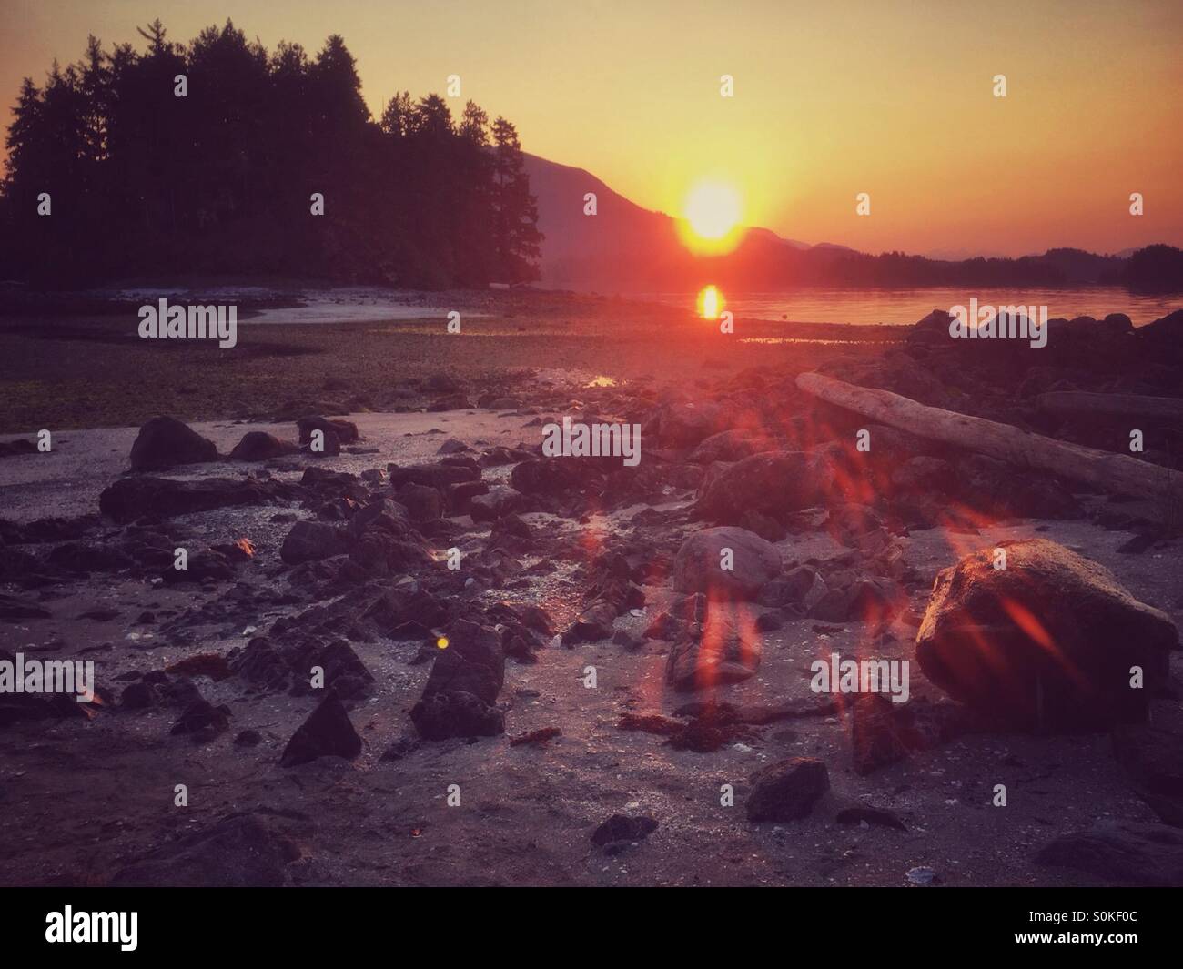 Setting sun on the islands near Vancouver island in British Columbia ...