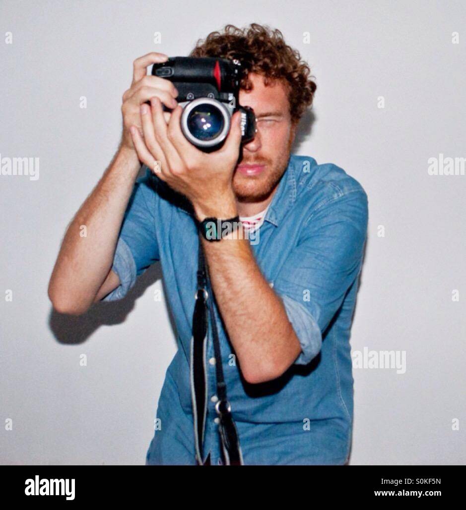 Photographer shooting model hi-res stock photography and images - Alamy