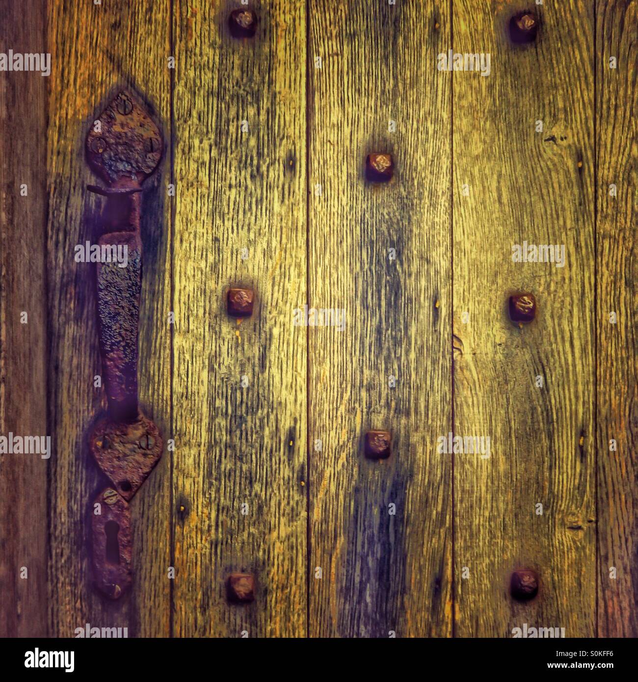 Medieval castle door with rusty handle and iron studs. Portencross ...