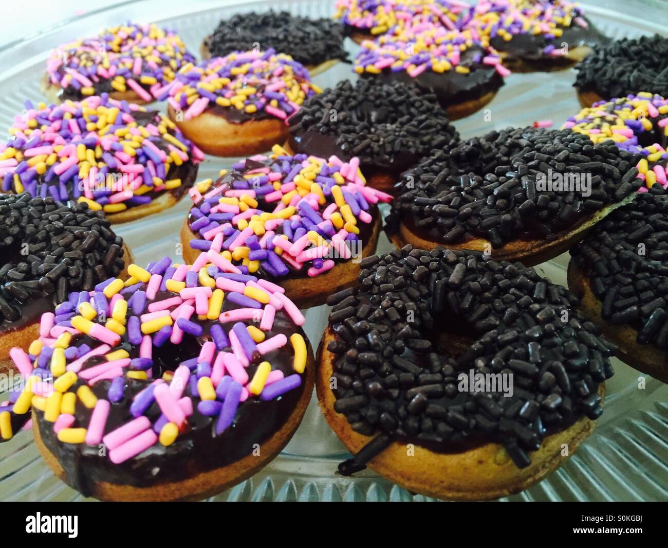 Donuts with Sprinkles Stock Photo - Alamy
