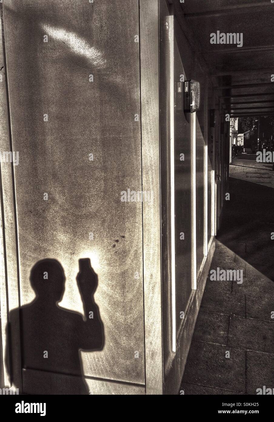 Momochrome shadow selfie Stock Photo - Alamy