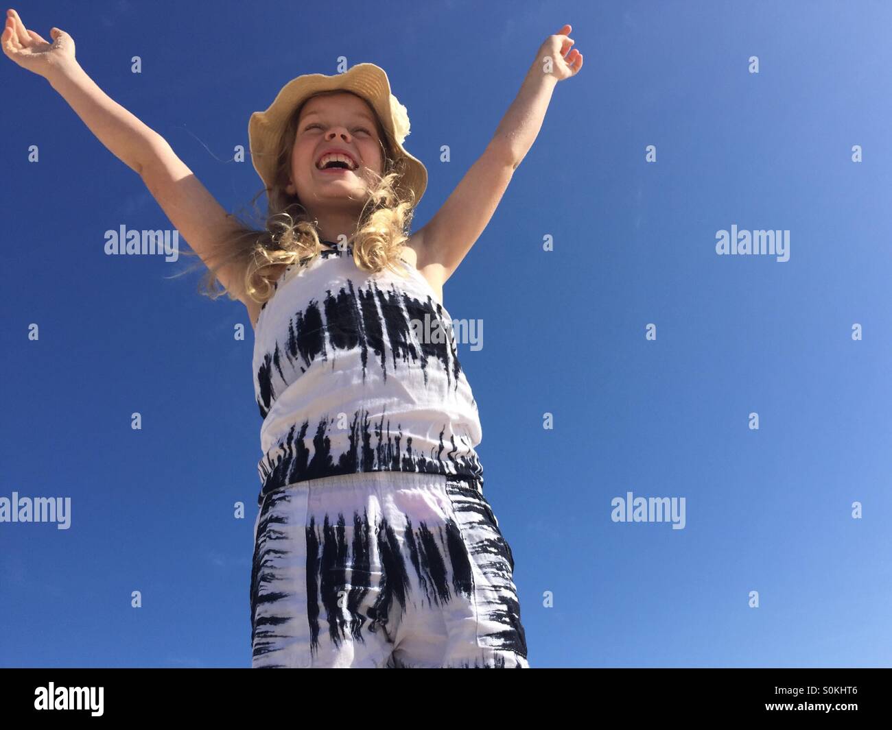 Girl enjoying the sunshine hi-res stock photography and images - Alamy
