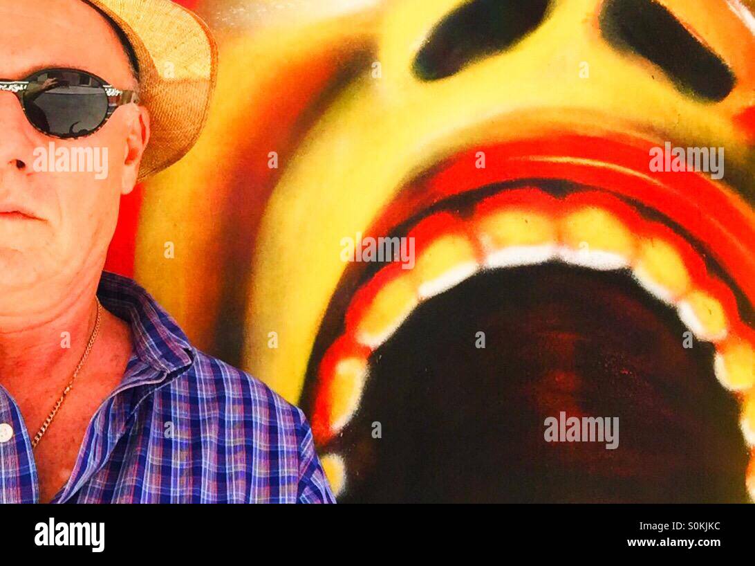 Man about to be devoured by a monster Stock Photo - Alamy