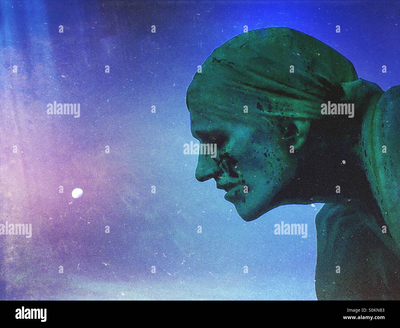 Statue ow woman contemplating the moon Stock Photo - Alamy