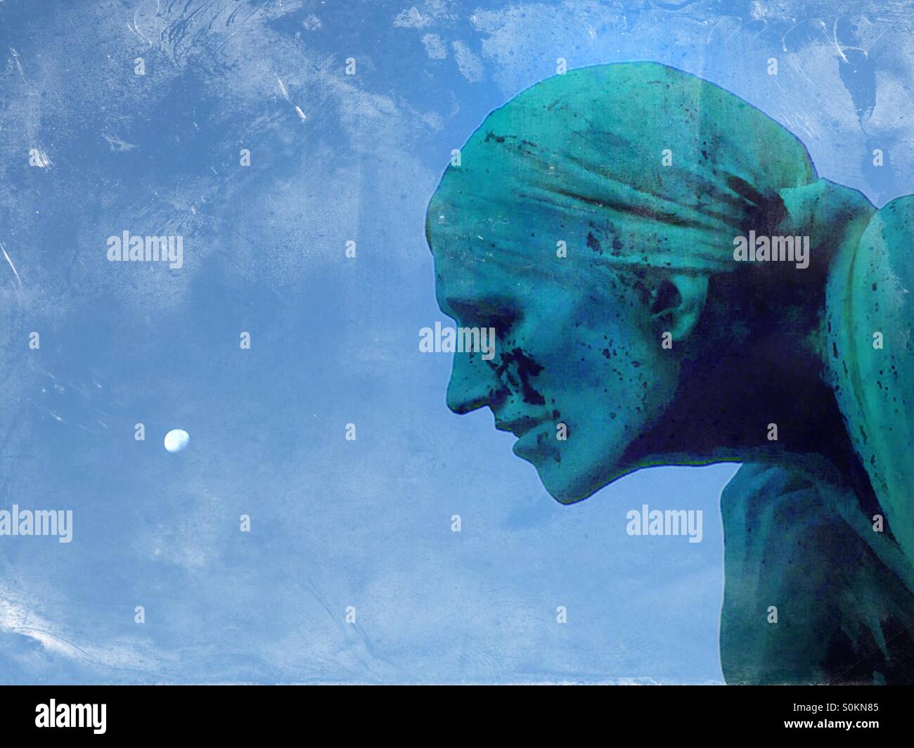 Statue of woman contemplating the moon Stock Photo - Alamy