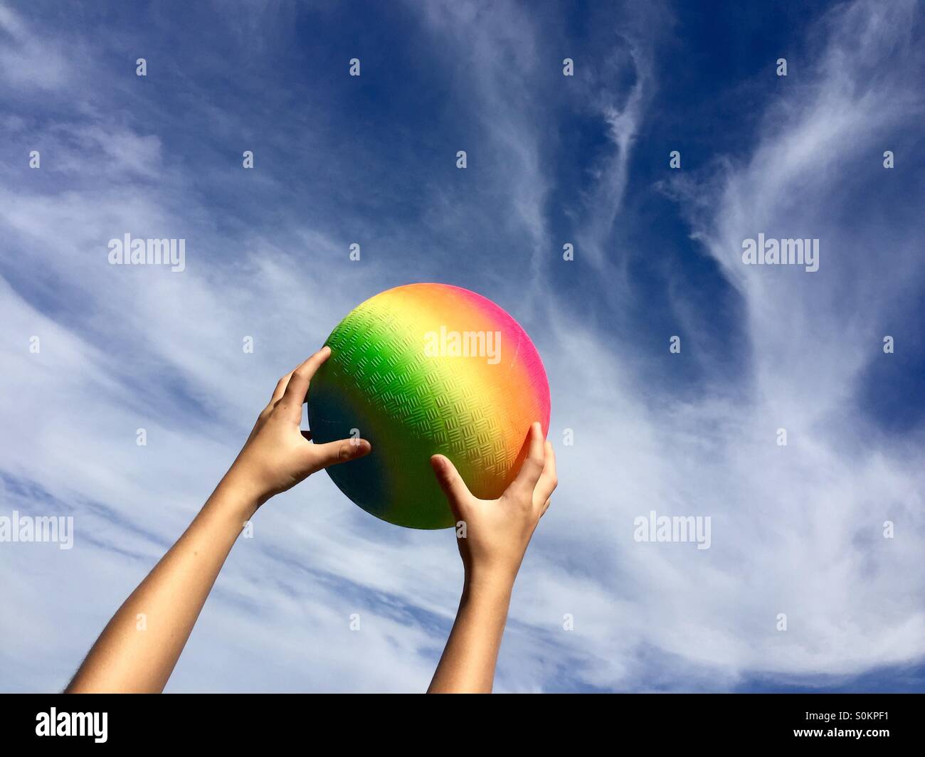 Rainbow sky with kids hi-res stock photography and images - Alamy