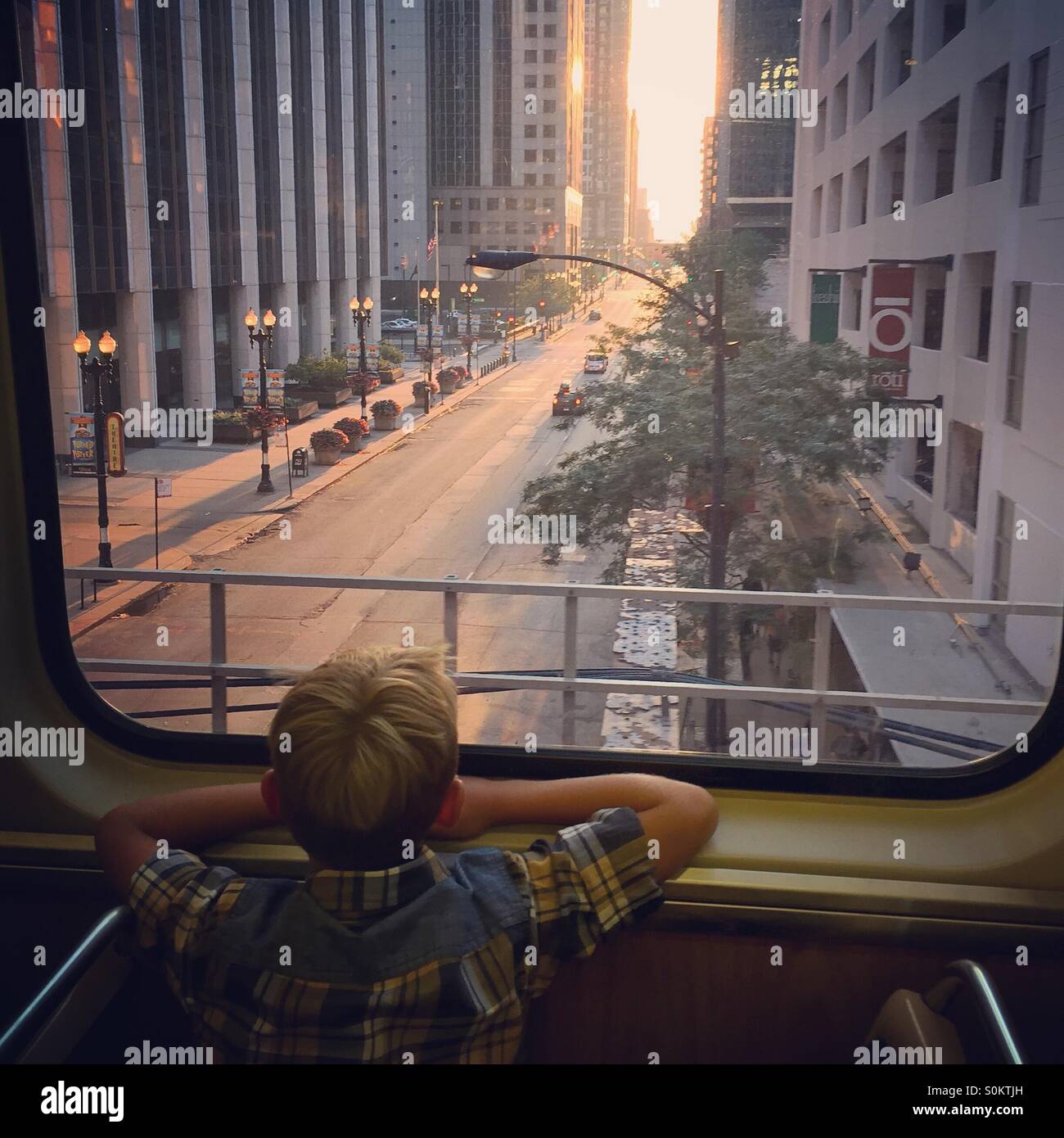 Boy near the window Stock Photo - Alamy