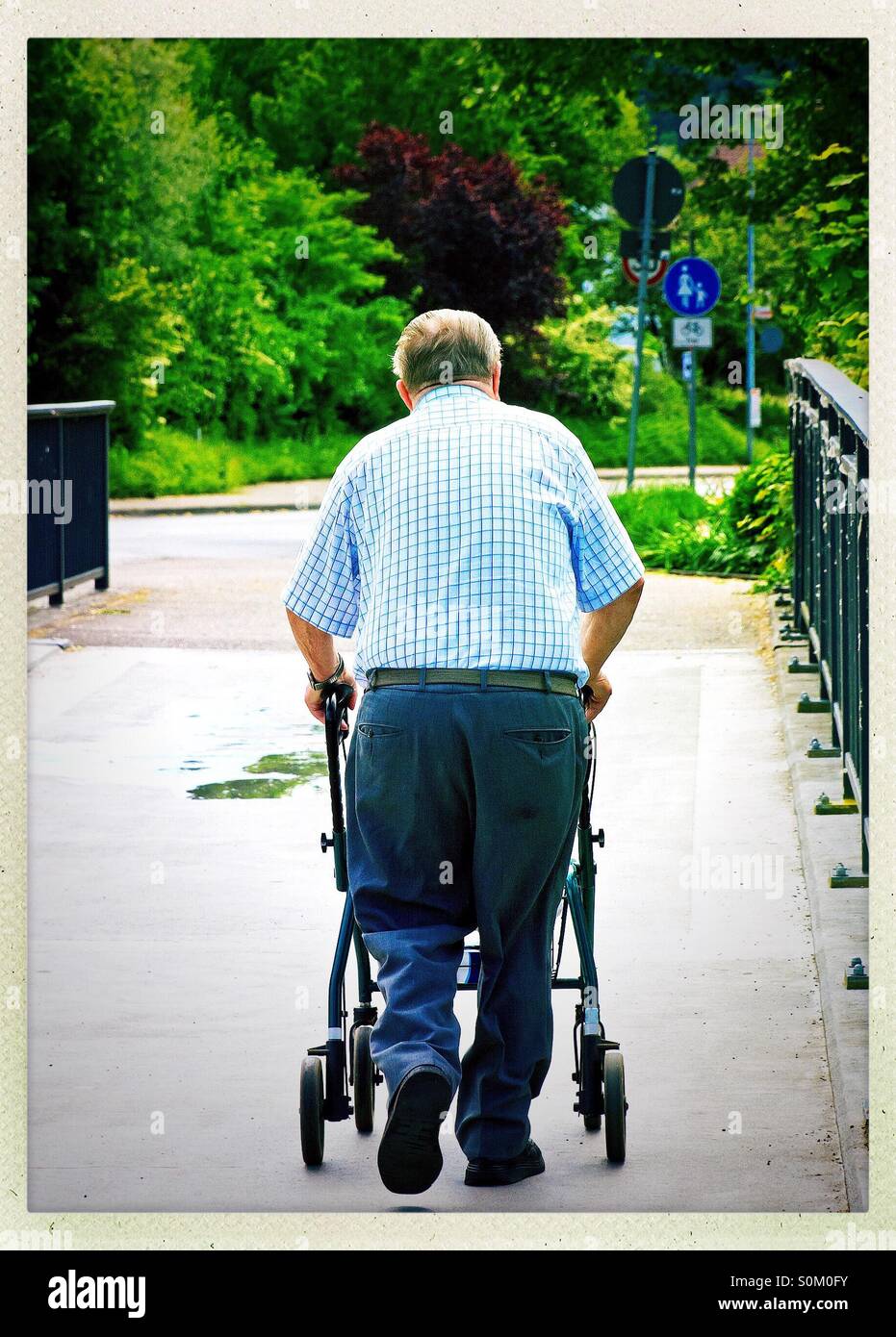 Old man on the way Stock Photo - Alamy