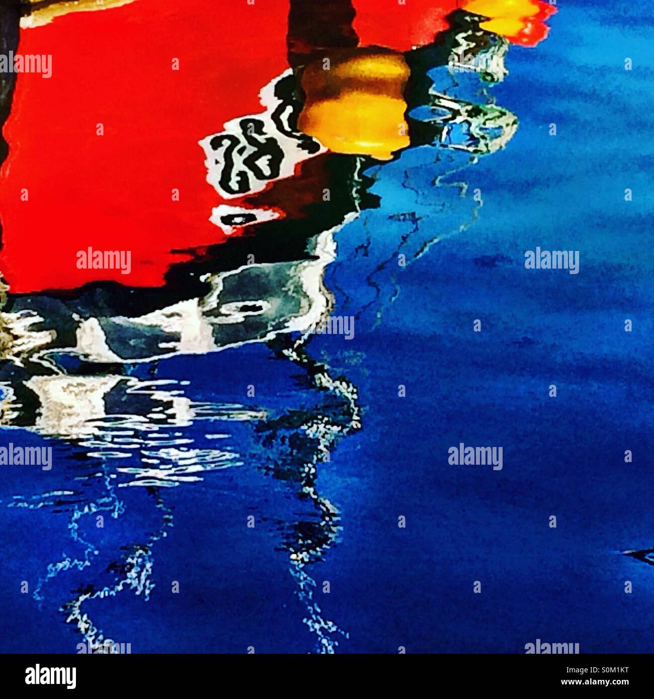Red fishing boats hi-res stock photography and images - Alamy