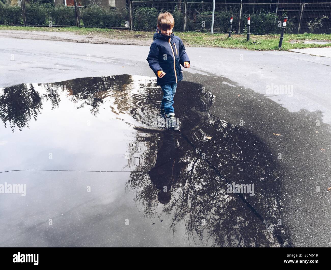 Huge puddle of rain water hi-res stock photography and images - Alamy