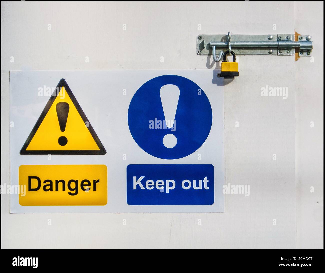 Industrial warning signs for danger and keep out with padlock and lock ...