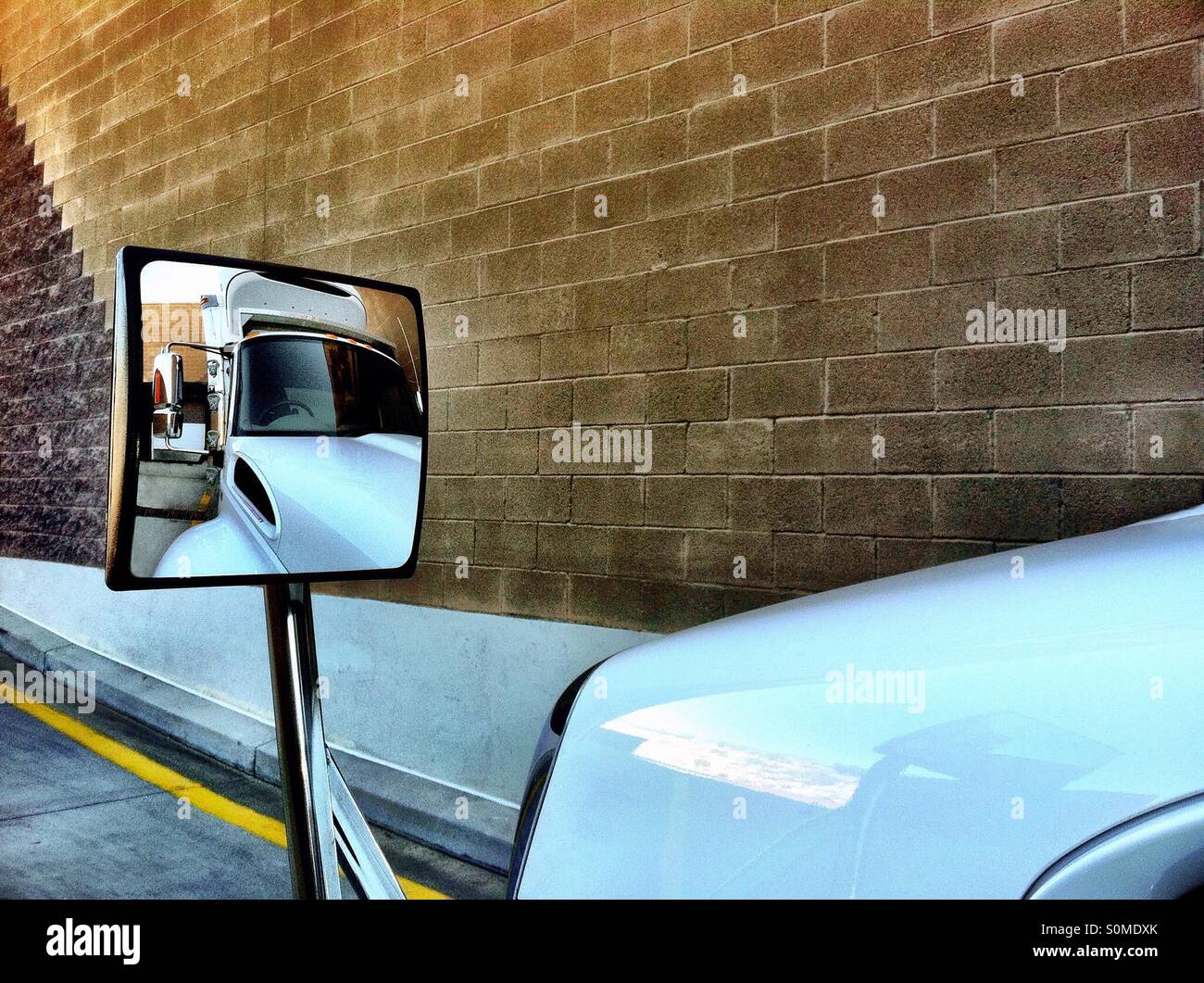 Reflection of commercial truck in it's side view mere Stock Photo - Alamy
