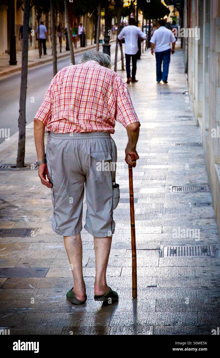 Poor old man walking stick hi-res stock photography and images - Alamy