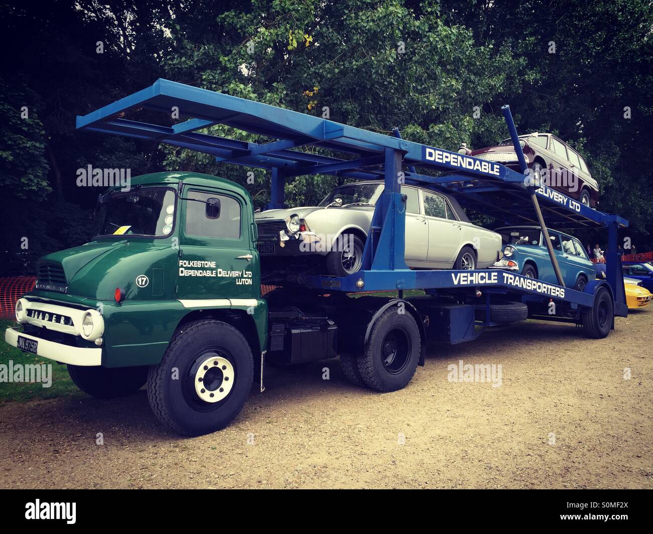 Vintage car transporter Stock Photo - Alamy