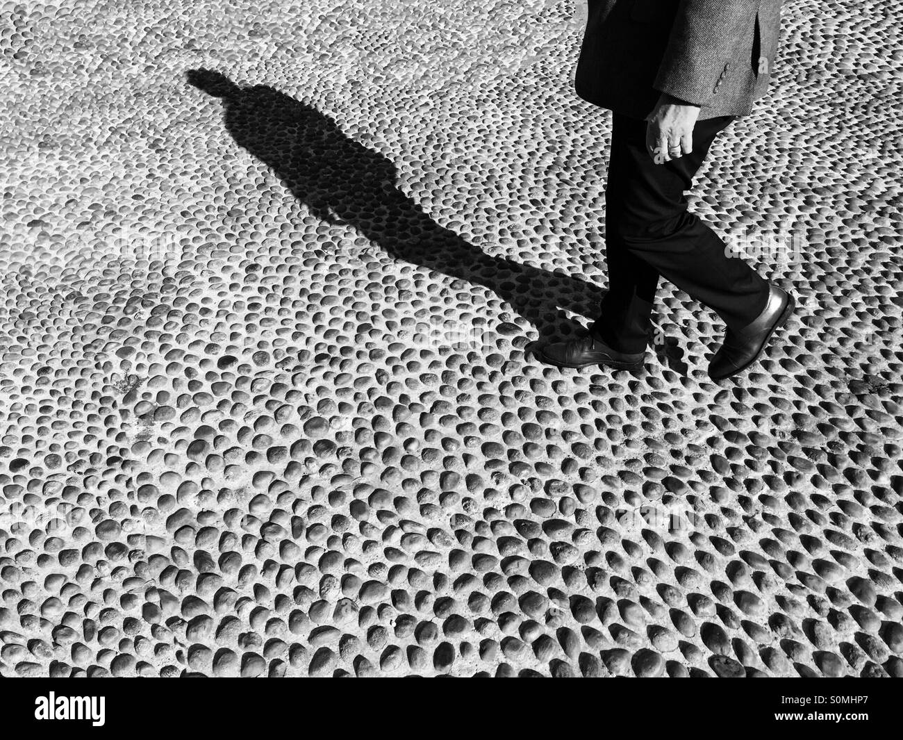 A man and his shadow Stock Photo - Alamy