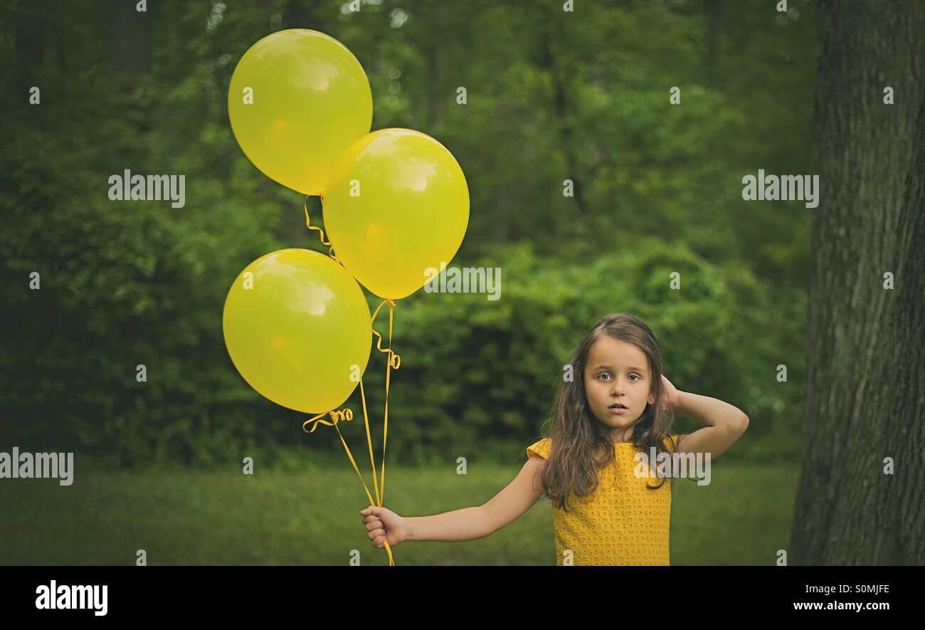Yellow balloons hi-res stock photography and images - Alamy