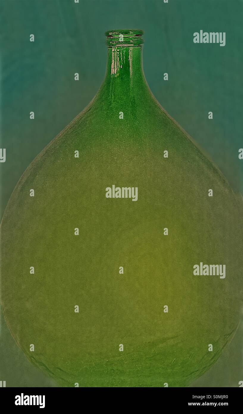 Green demijohn bottle Stock Photo - Alamy