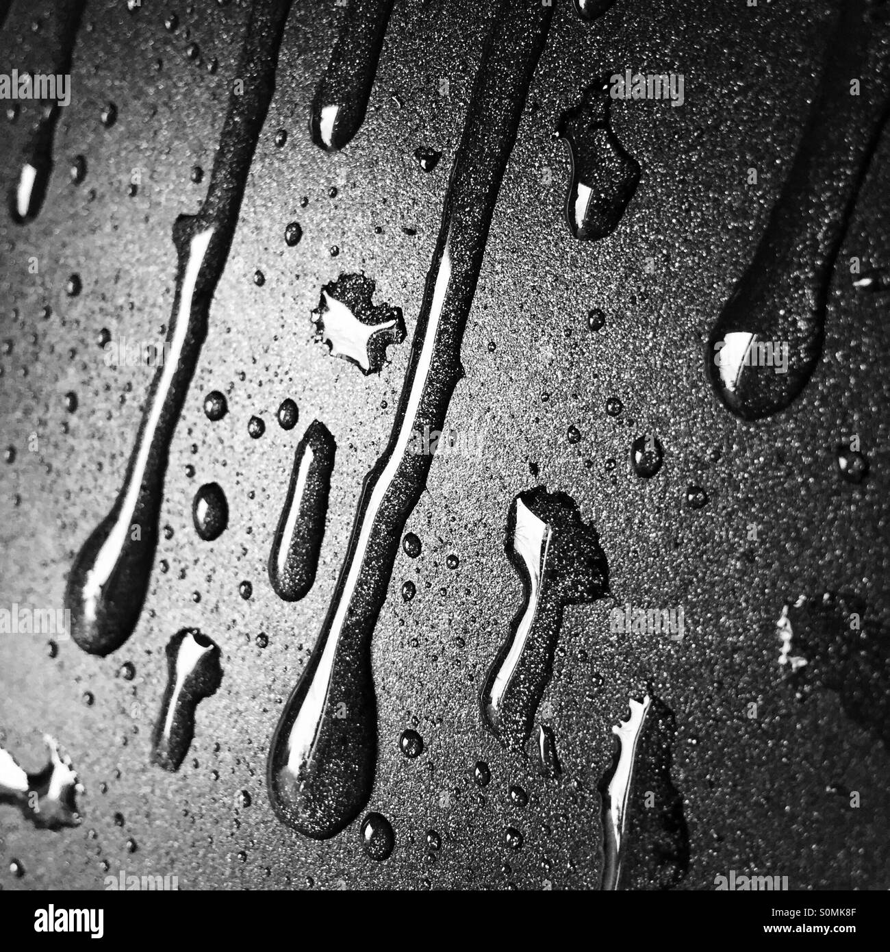 Dripping liquid Black and White Stock Photos & Images - Alamy