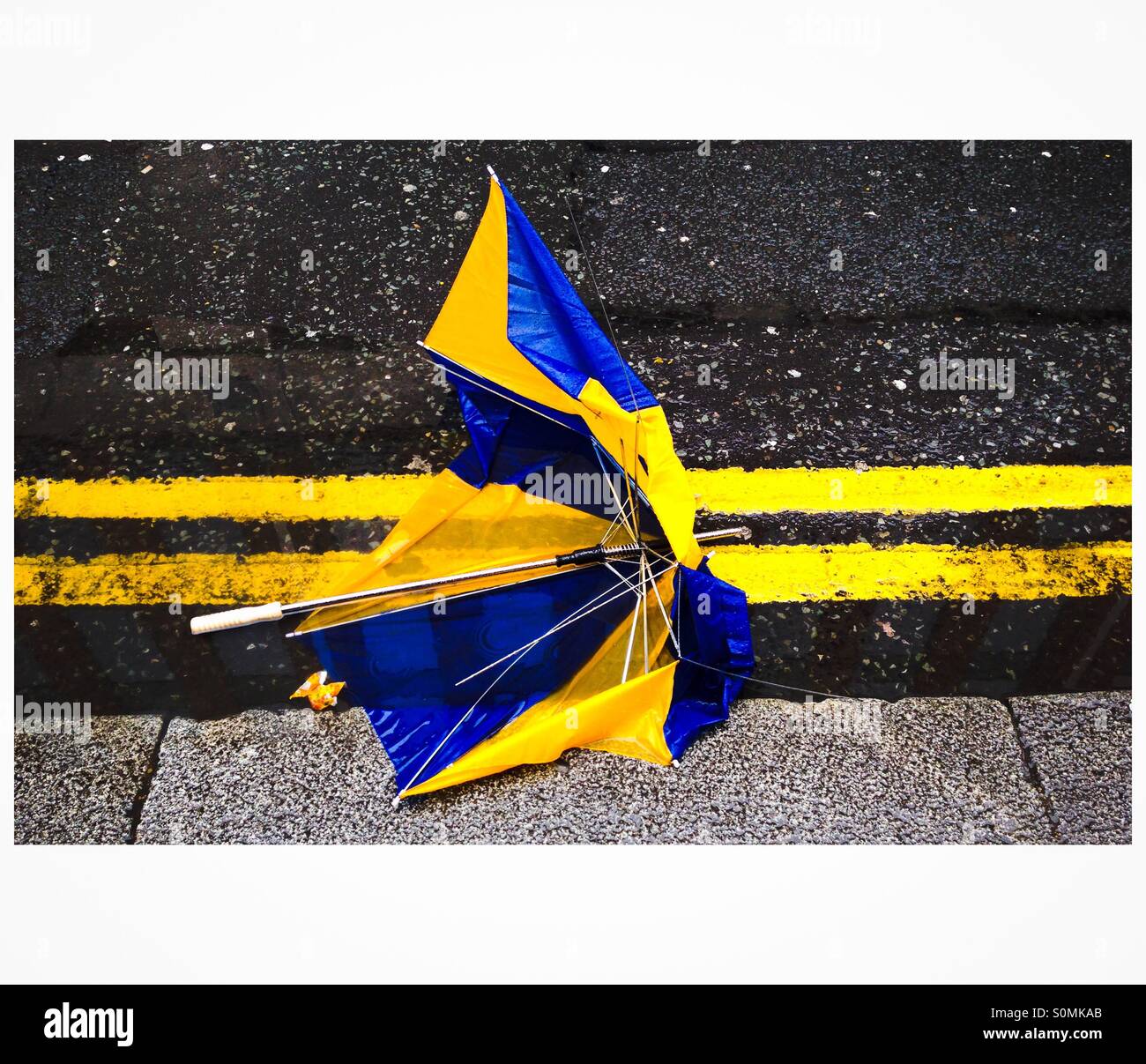 Broken umbrella hi-res stock photography and images - Alamy