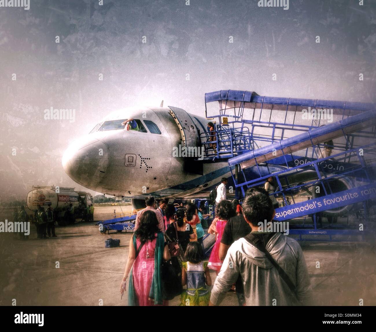 Boarding an Indigo A320 airliner at Varanasi airport, India Stock Photo ...