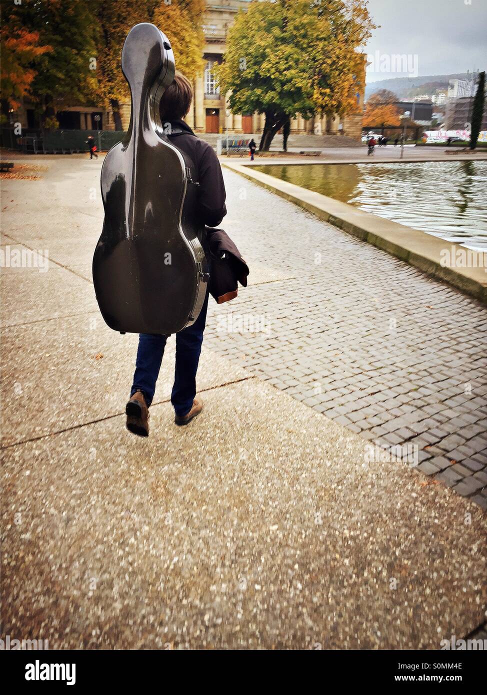 Musician on the way Stock Photo - Alamy