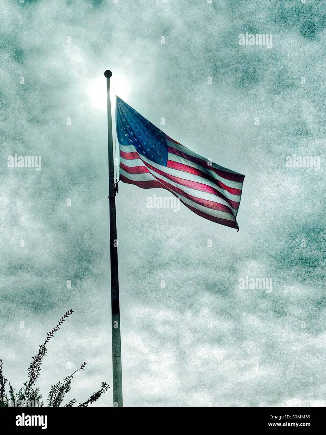 American flag blowing in the wind hi-res stock photography and images ...