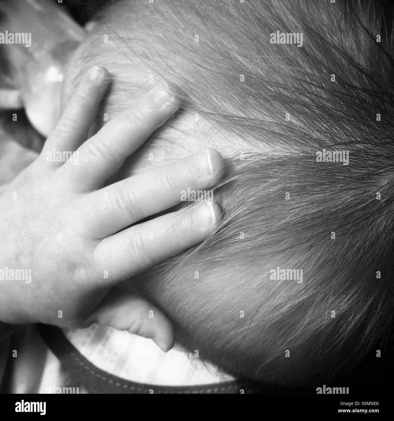 Babys head hi-res stock photography and images - Alamy