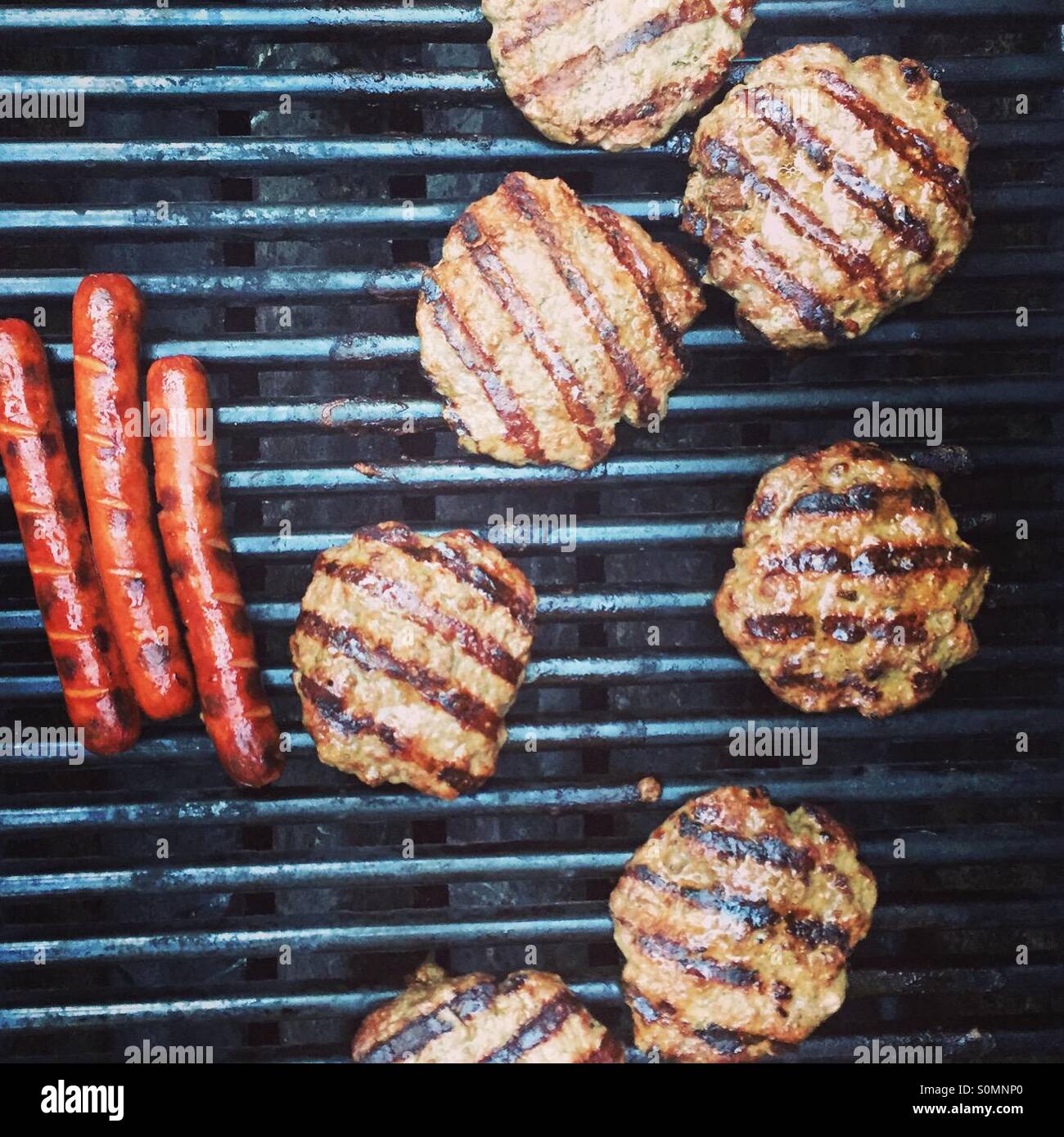 Burgers on the BBQ Stock Photo - Alamy