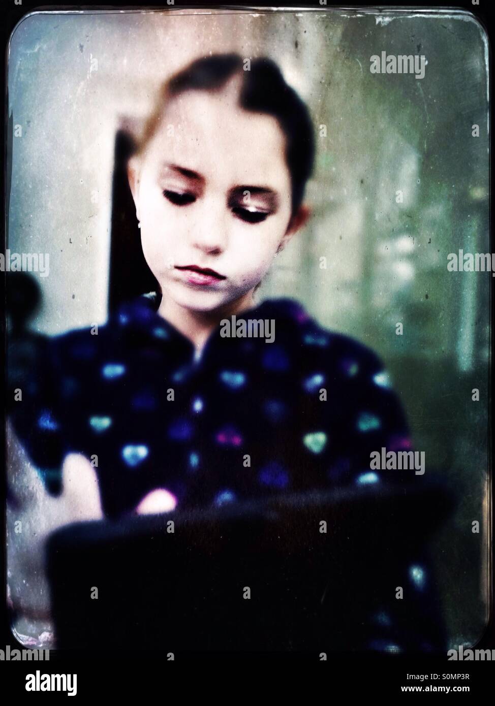 Girl using tablet Stock Photo - Alamy