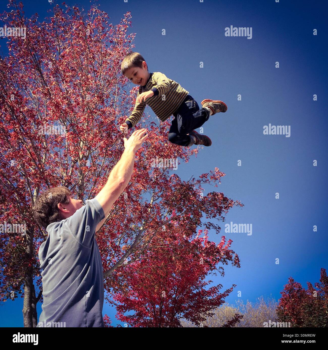 Father son catch hi-res stock photography and images - Alamy