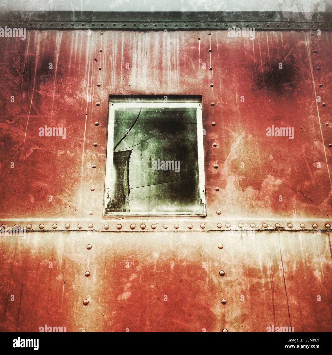 A window of an old, red train Stock Photo - Alamy