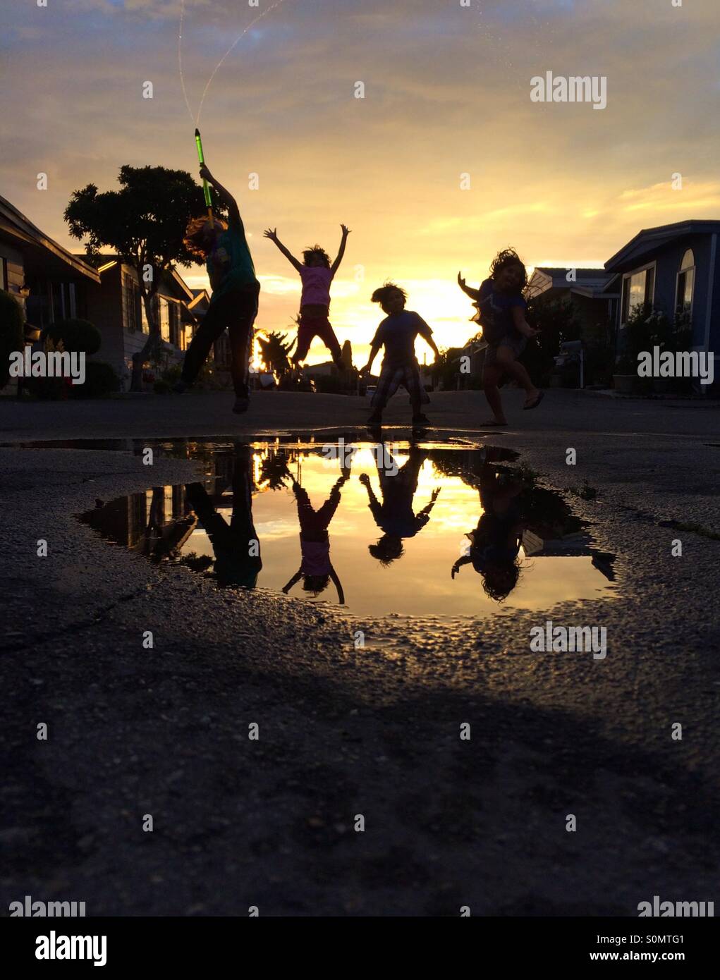 School kids rain hi-res stock photography and images - Alamy