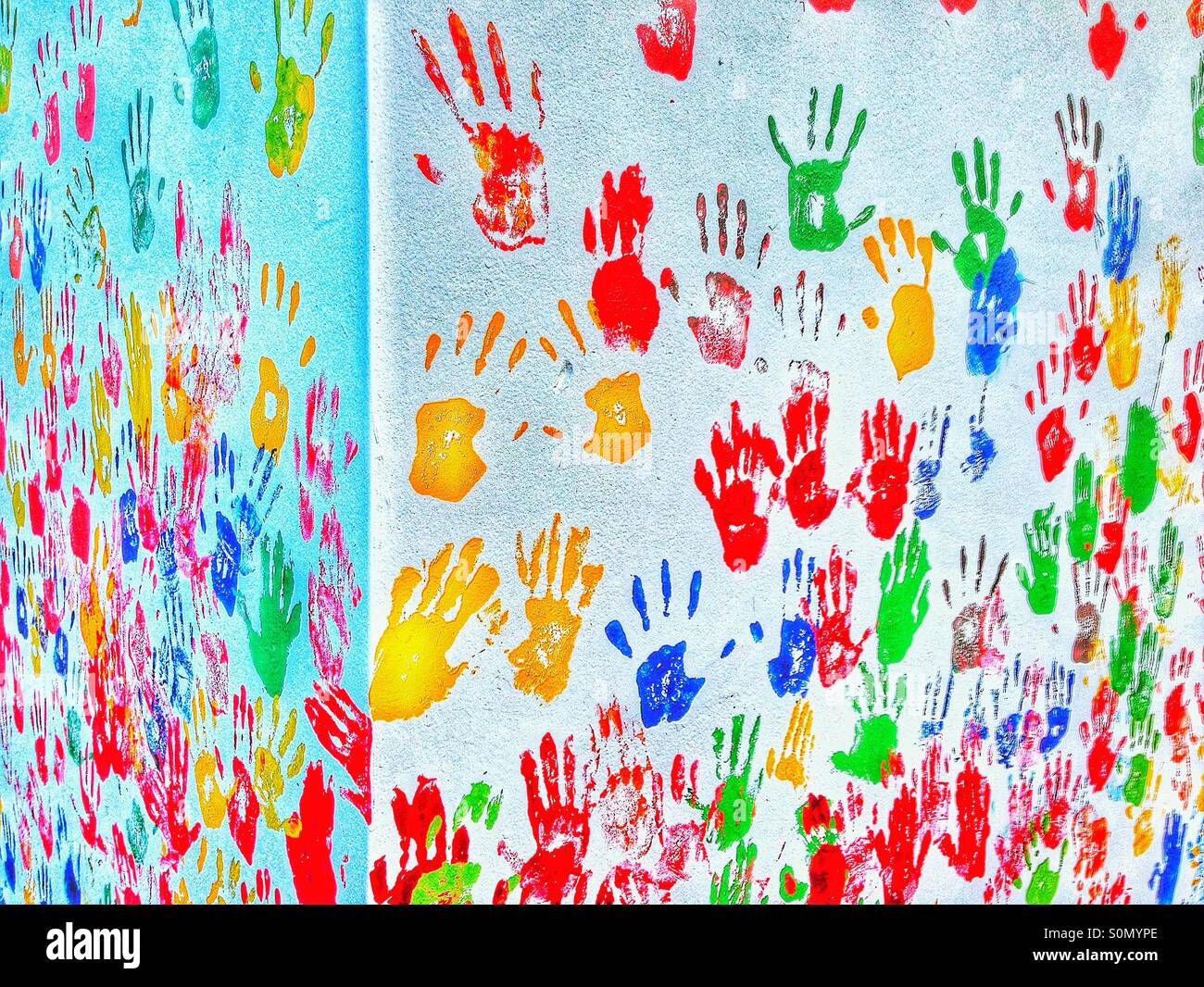 Blue handprints hi-res stock photography and images - Alamy