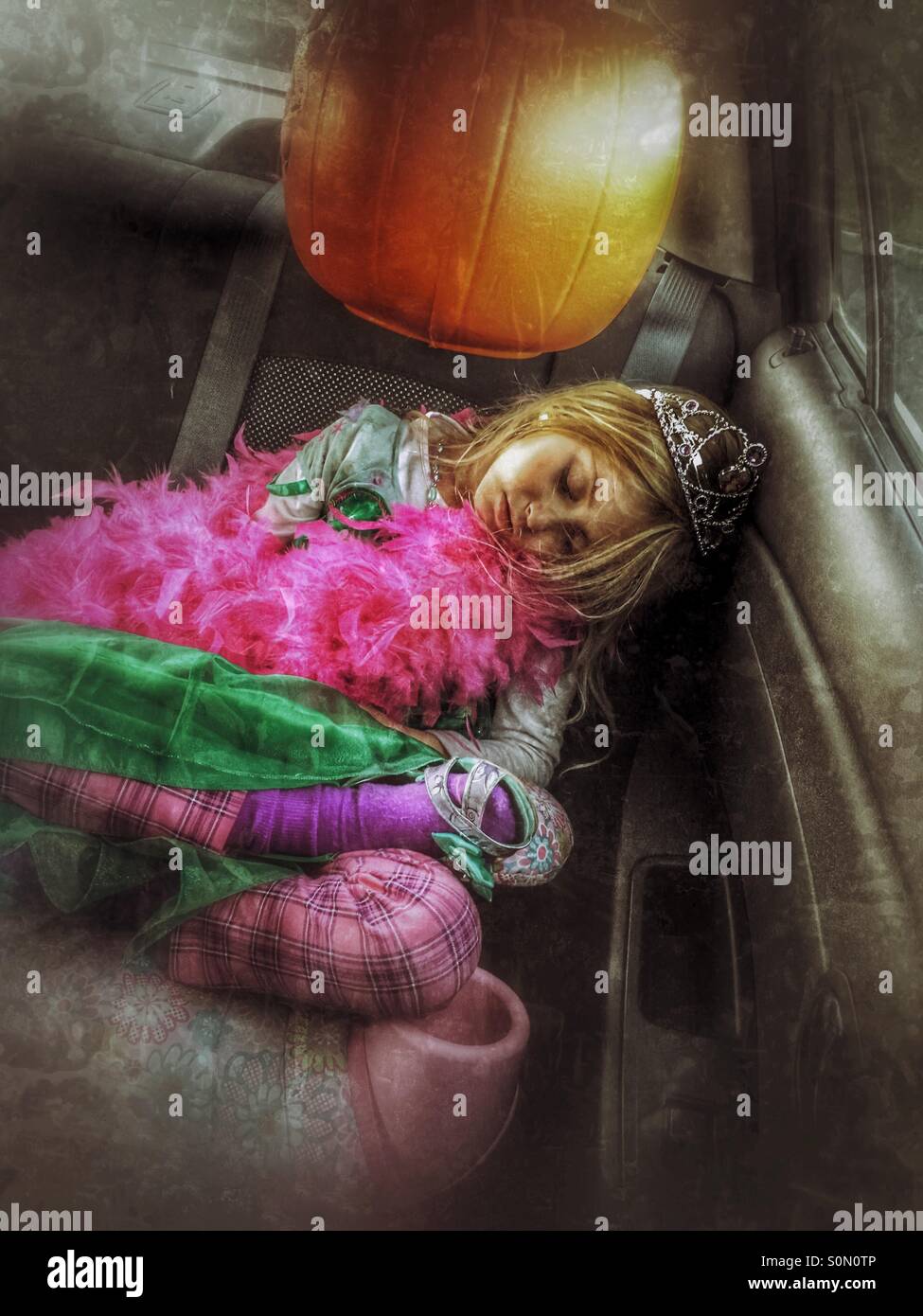 A princess falls asleep before trick or treating Stock Photo - Alamy
