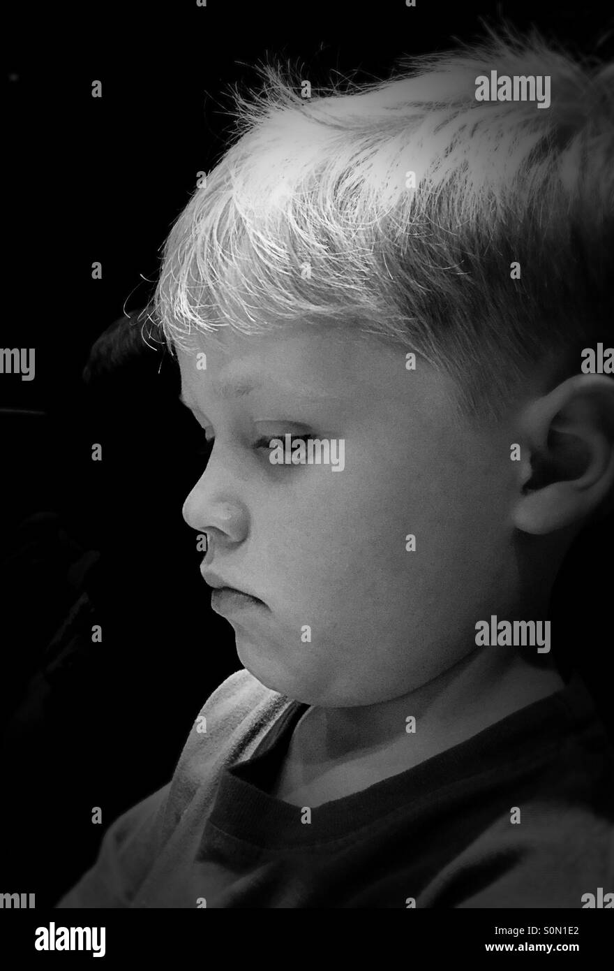 Grumpy kid hi-res stock photography and images - Alamy
