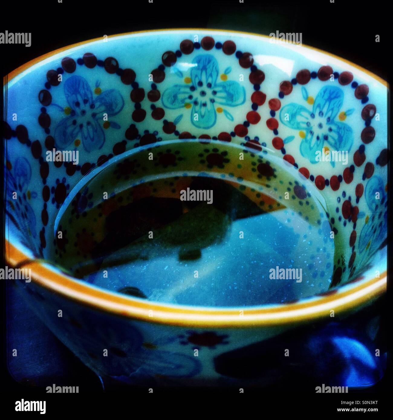 Cup of tea with sky reflection Stock Photo - Alamy