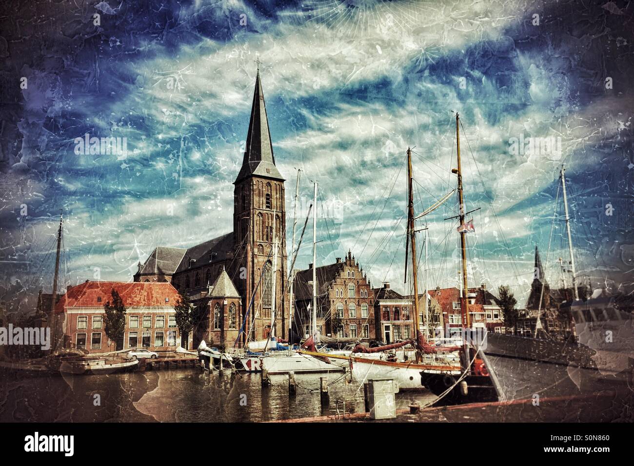 Port with houses and a church. Port with characteristic old Dutch ...