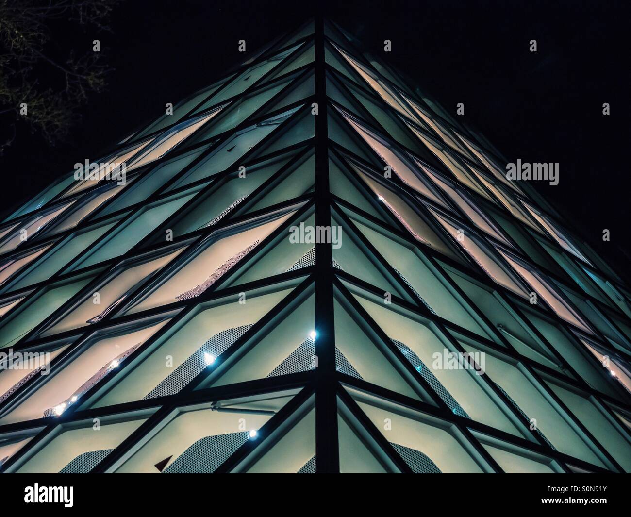 Building at night. Blue and White Stock Photo - Alamy