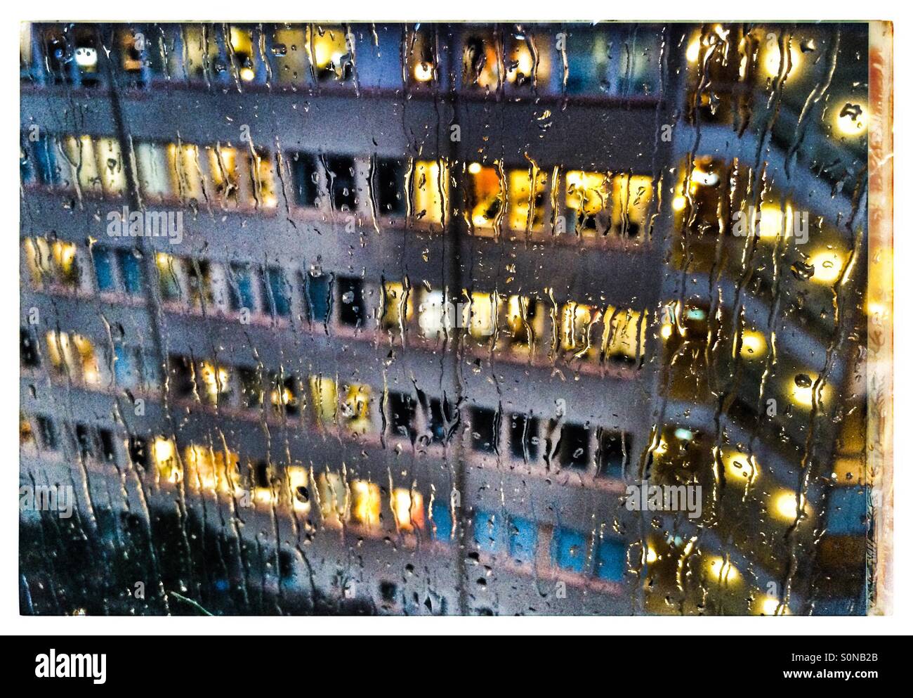 office building photographed by rainy window Stock Photo - Alamy