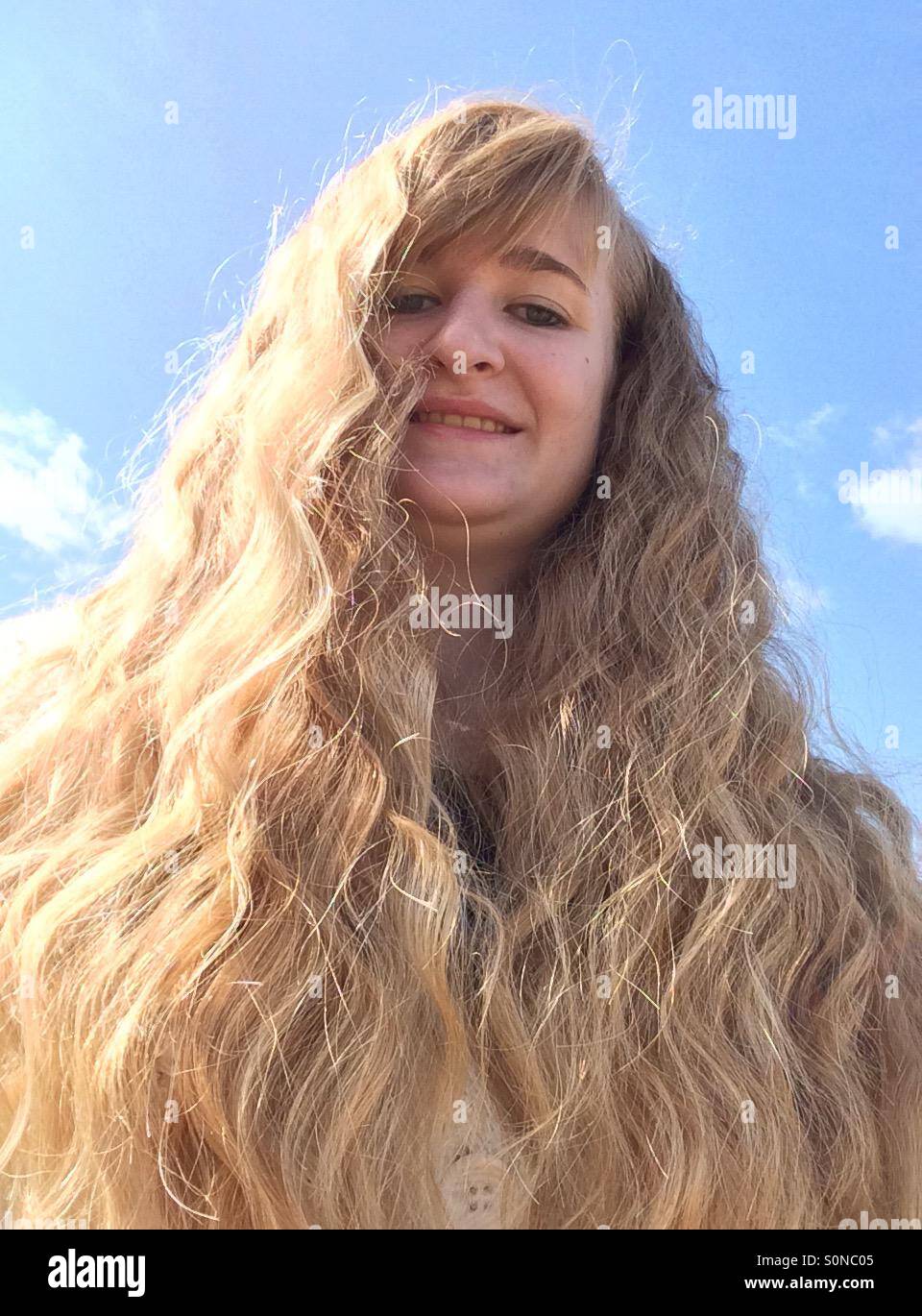 Girl in the sun hi-res stock photography and images - Alamy