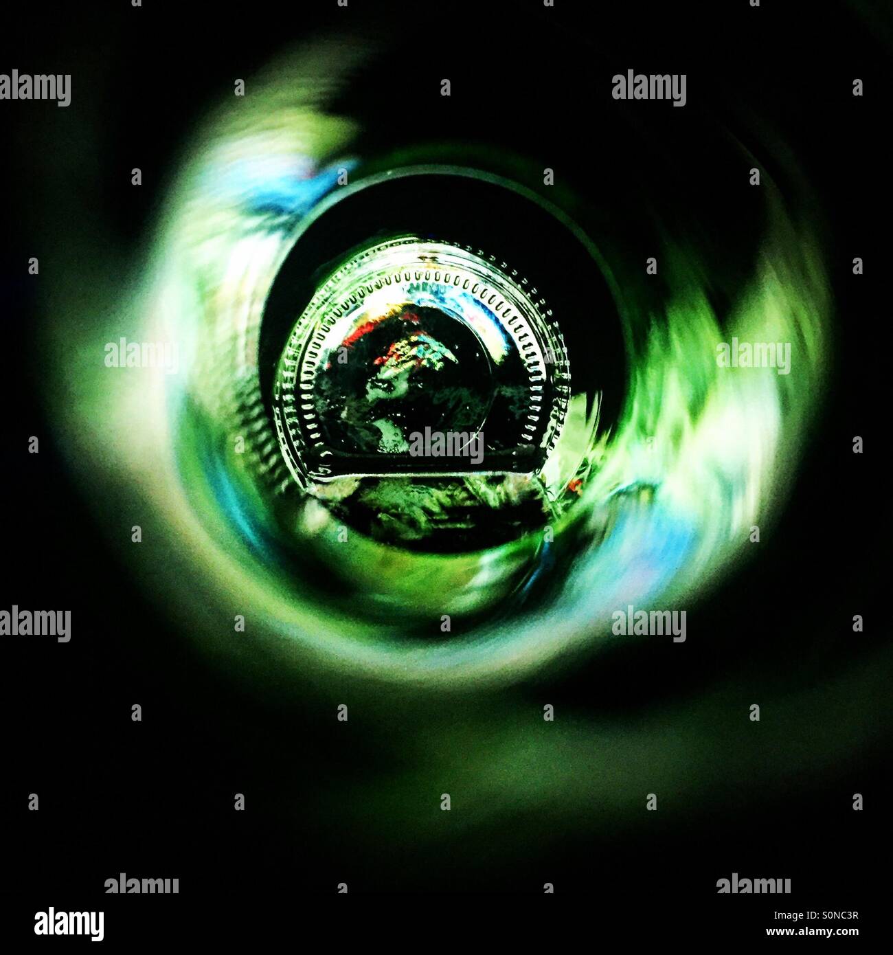 The inside of a green beer bottle Stock Photo - Alamy