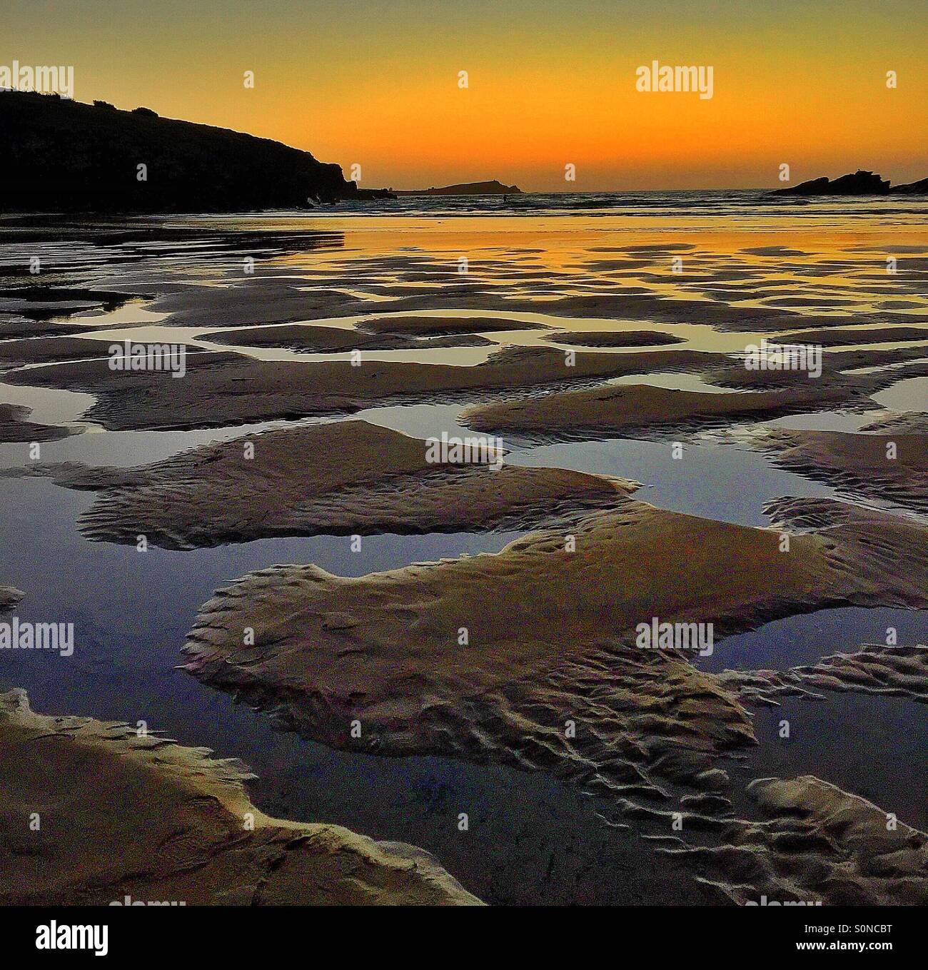 Reflections on beach sunrise hi-res stock photography and images - Alamy