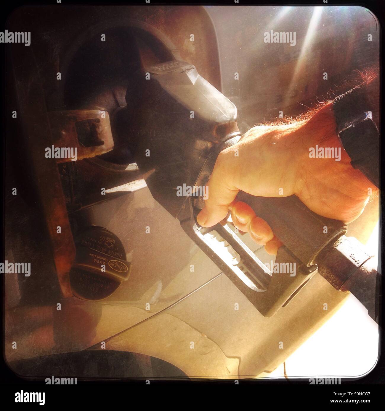 Pumping gasoline fuel car hi-res stock photography and images - Alamy